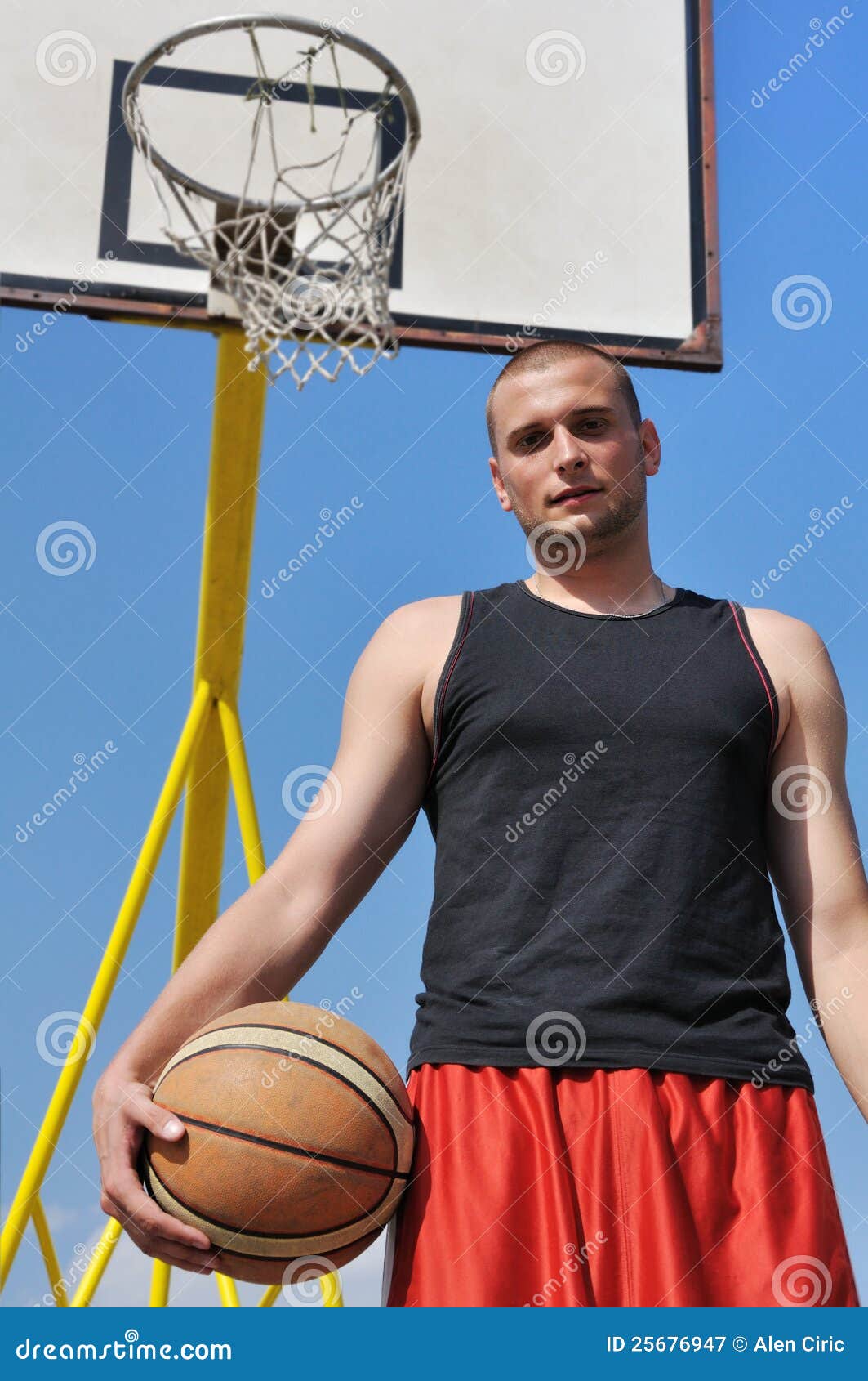 Basketball player posing stock image. Image of player - 25676947