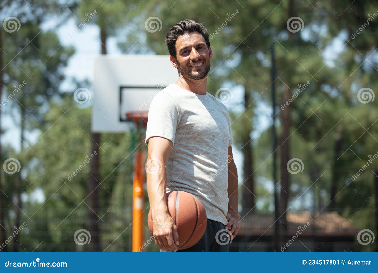 Basketball Player Posing Outdoors Stock Image - Image of male, people ...