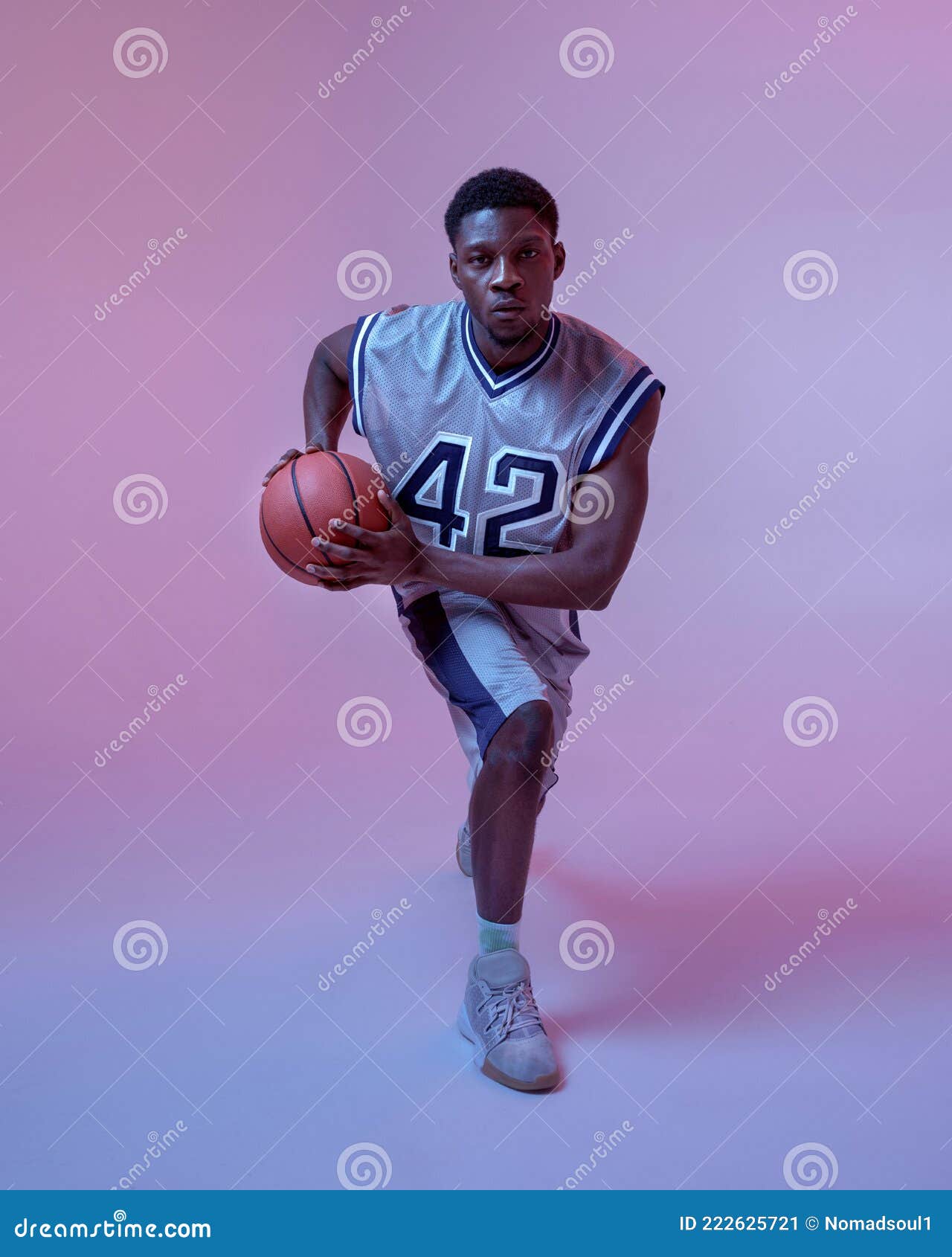 Basketball Player Practicing with Ball in Studio Stock Image - Image of ...