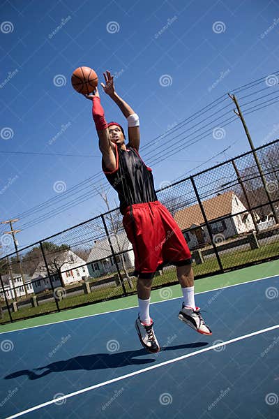 Basketball Player Shooting stock image. Image of player - 9253249