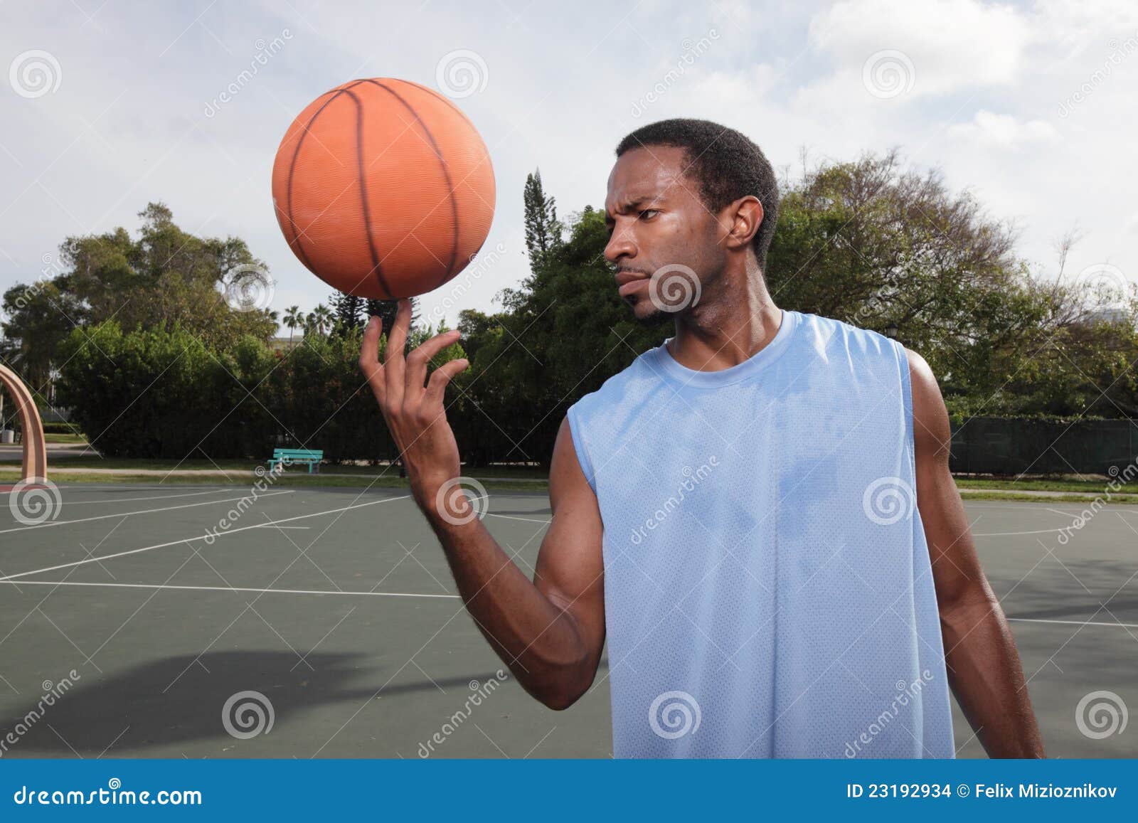 Basketball Player Spinning the Ball Stock Photo - Image of recreation ...