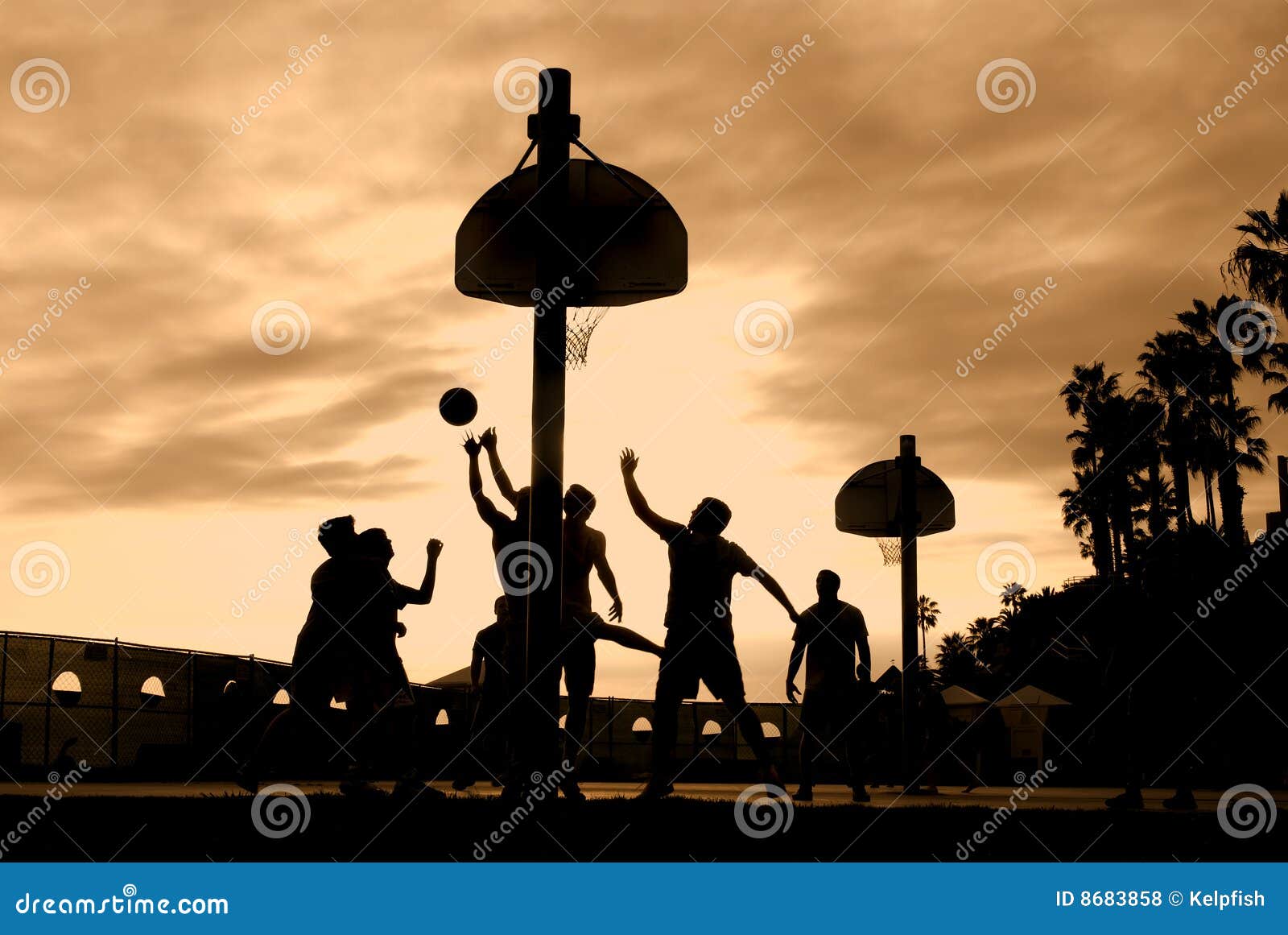 Basketball Players at Sunset Stock Photo - Image of park, focus: 8683858