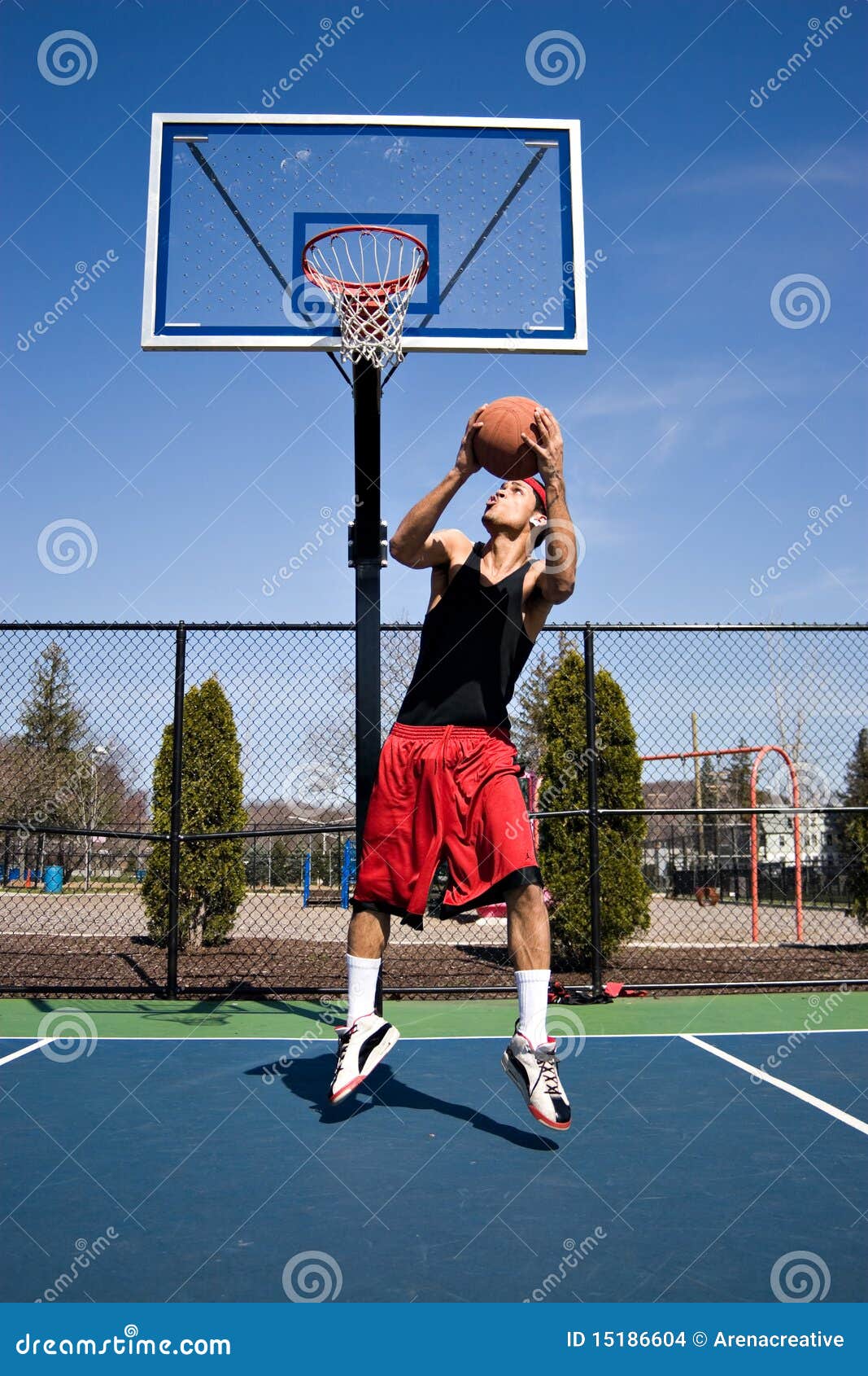 Basketball Reverse Dunk stock photo. Image of backboard - 15186604