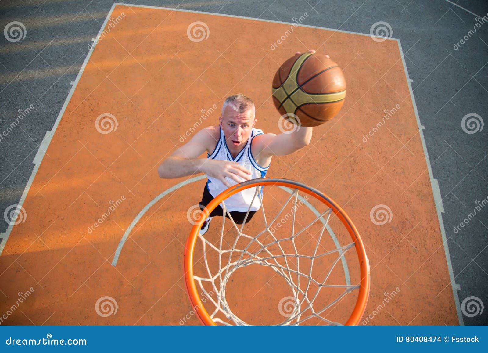 Basketball Street Player Making a Slam Dunk Stock Photo - Image of ...