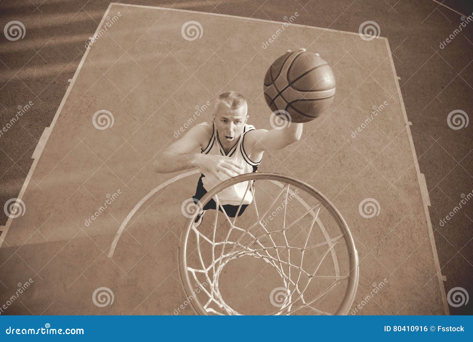 Basketball Street Player Making a Slam Dunk Stock Photo - Image of ...