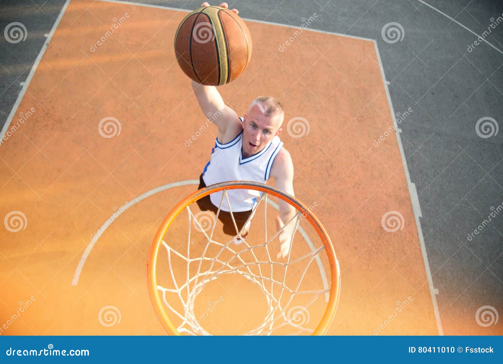Basketball Street Player Making a Slam Dunk Stock Photo - Image of ...