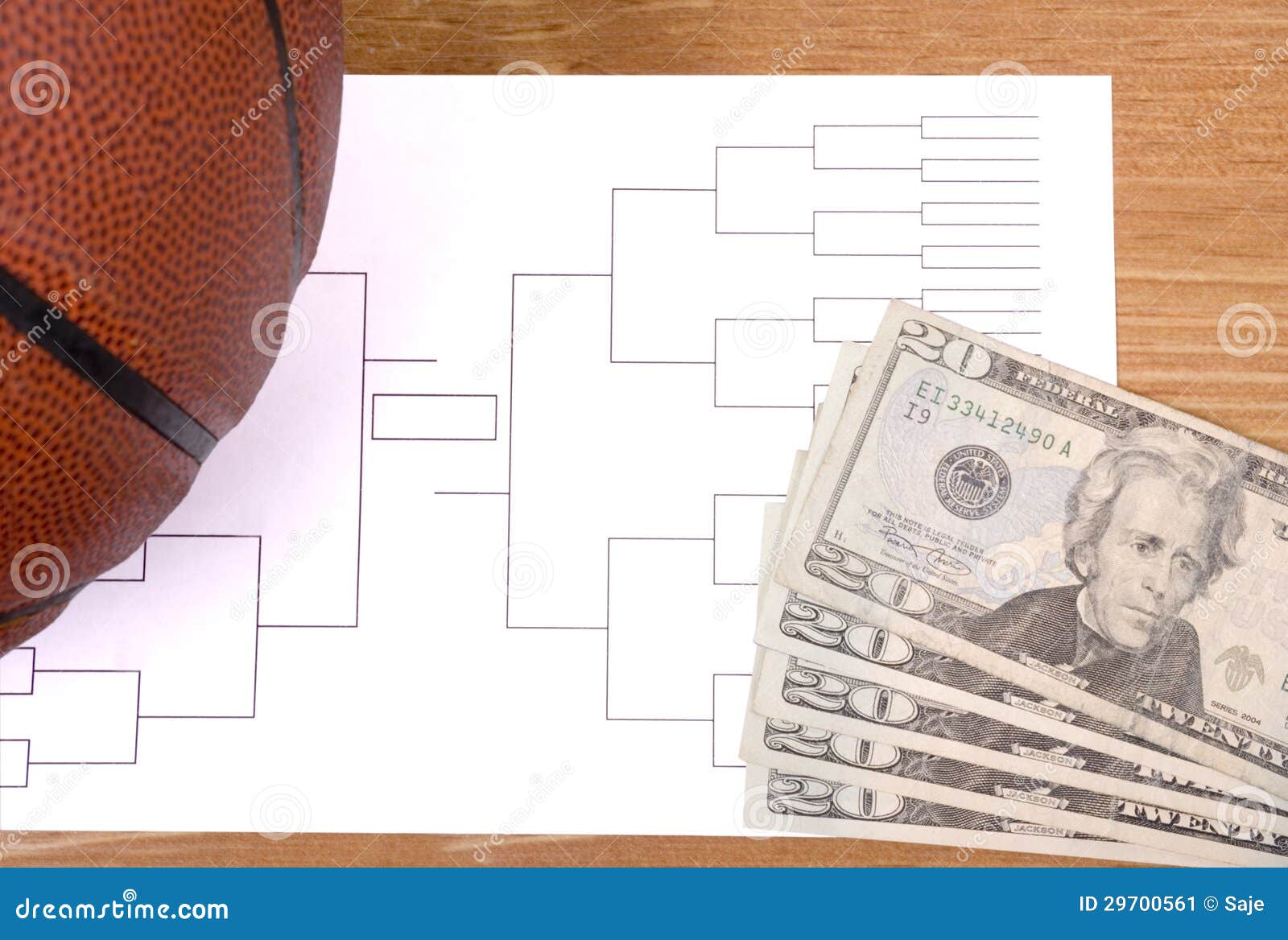 March Madness Basketball Bracket and Fanned Money Stock Image - Image ...