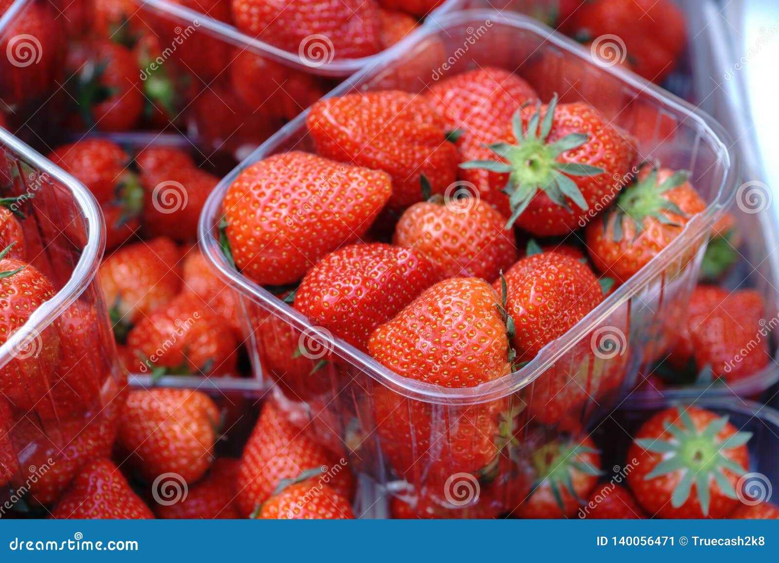 Baskets of Fresh Delicious Strawberries in Store, Closeup. Stock Image ...