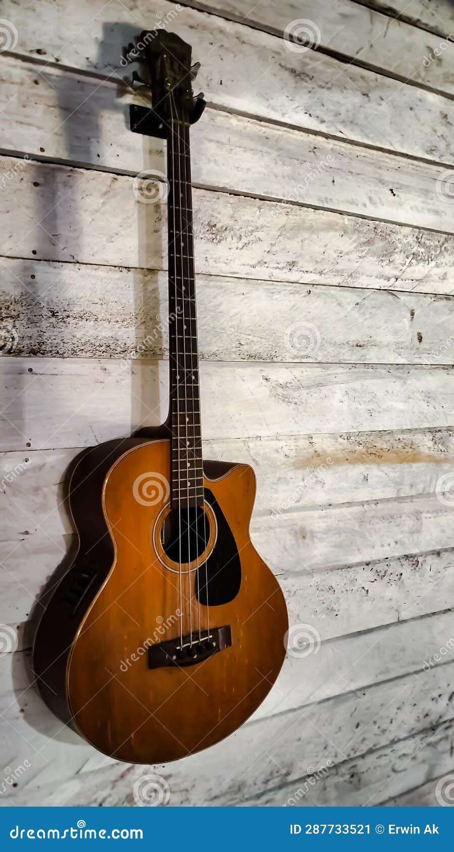 Bass Guitar Hangs on a Plank Wall Stock Image - Image of guitarist ...