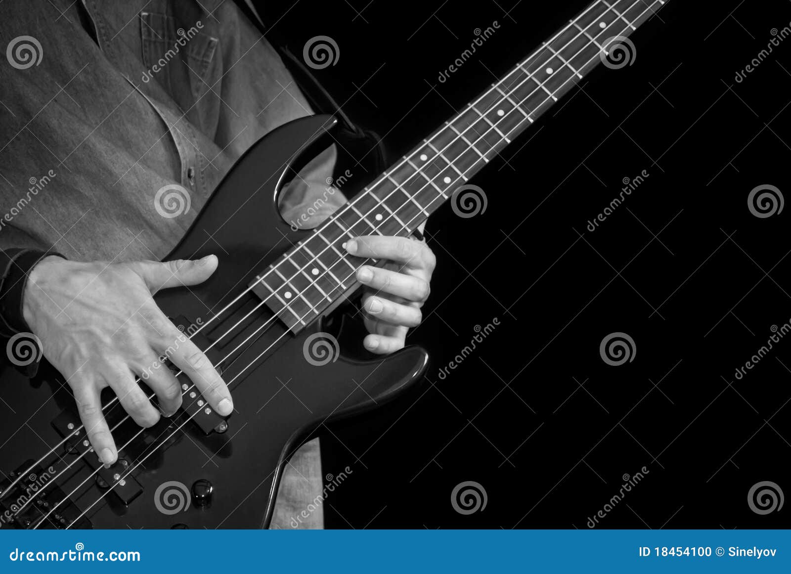 Bass-guitar in male hands stock photo. Image of melody - 18454100