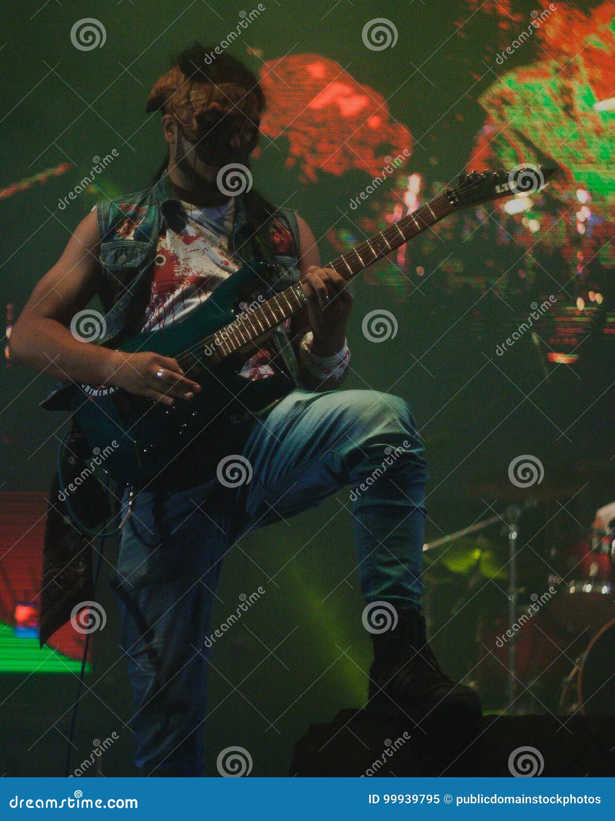 Bass Guitar Player With Mask Picture. Image: 99939795