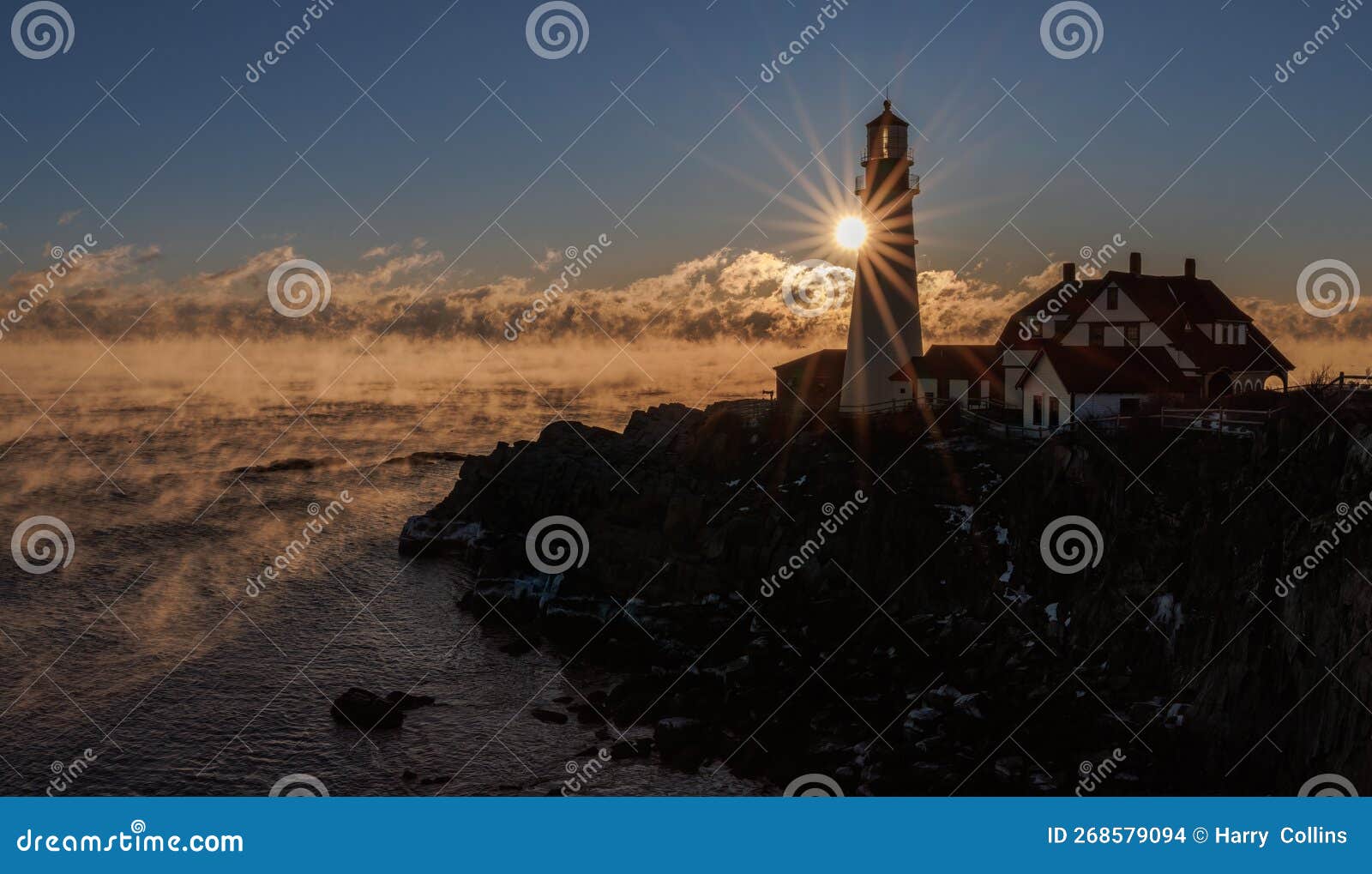 Bass Harbor Lighthouse with Sun Rays Stock Photo - Image of ocean, dawn ...