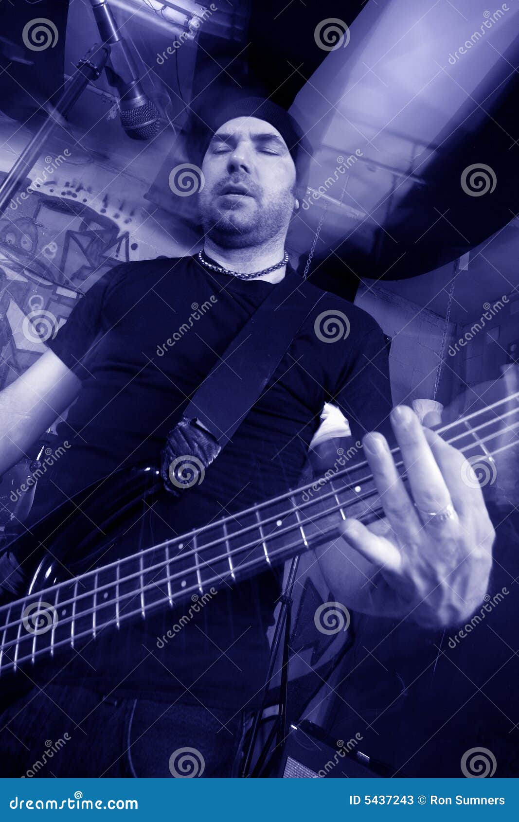 Bass player blue stock image. Image of musician, male - 5437243