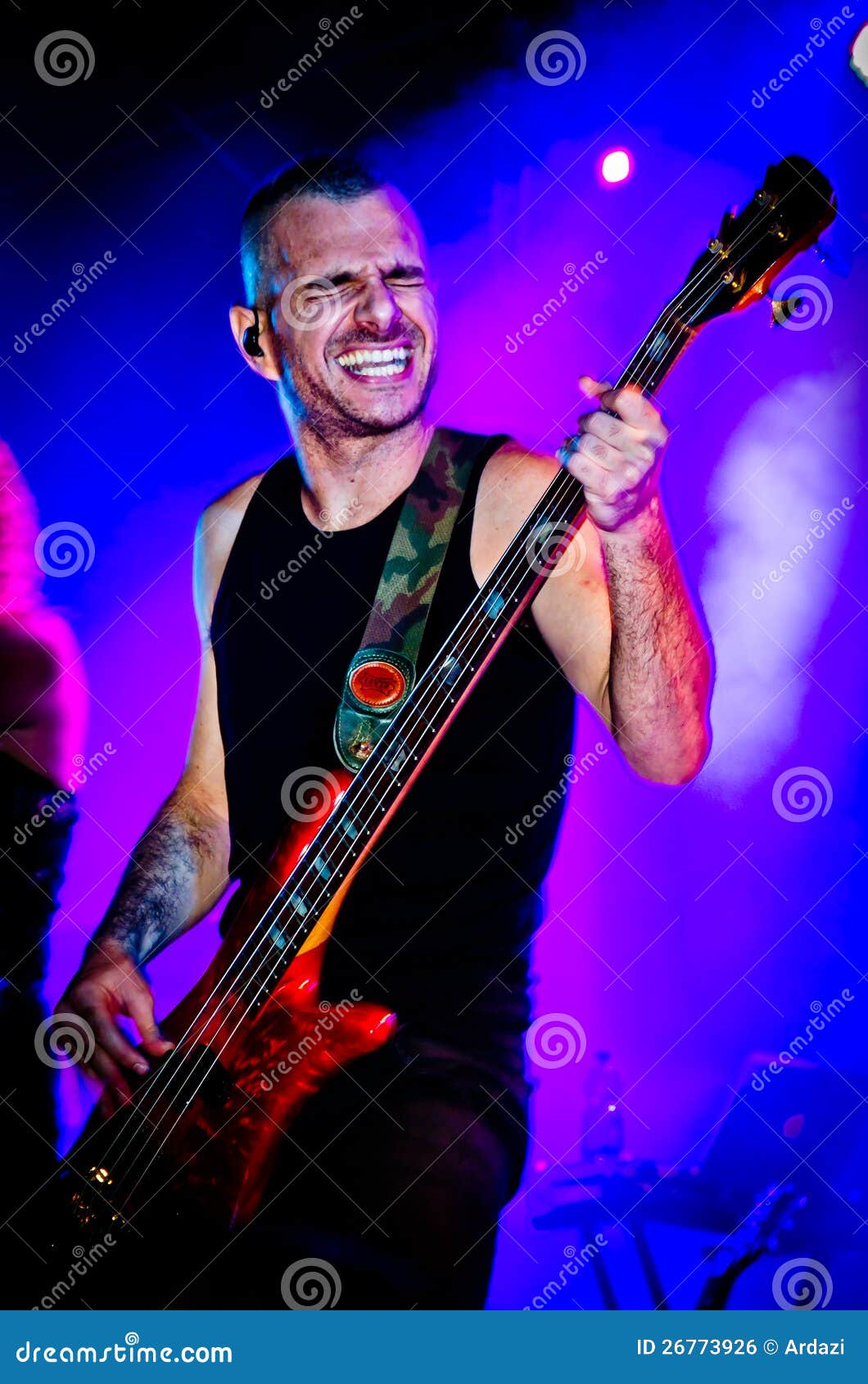 Bass player in a rock show editorial photo. Image of expression - 26773926