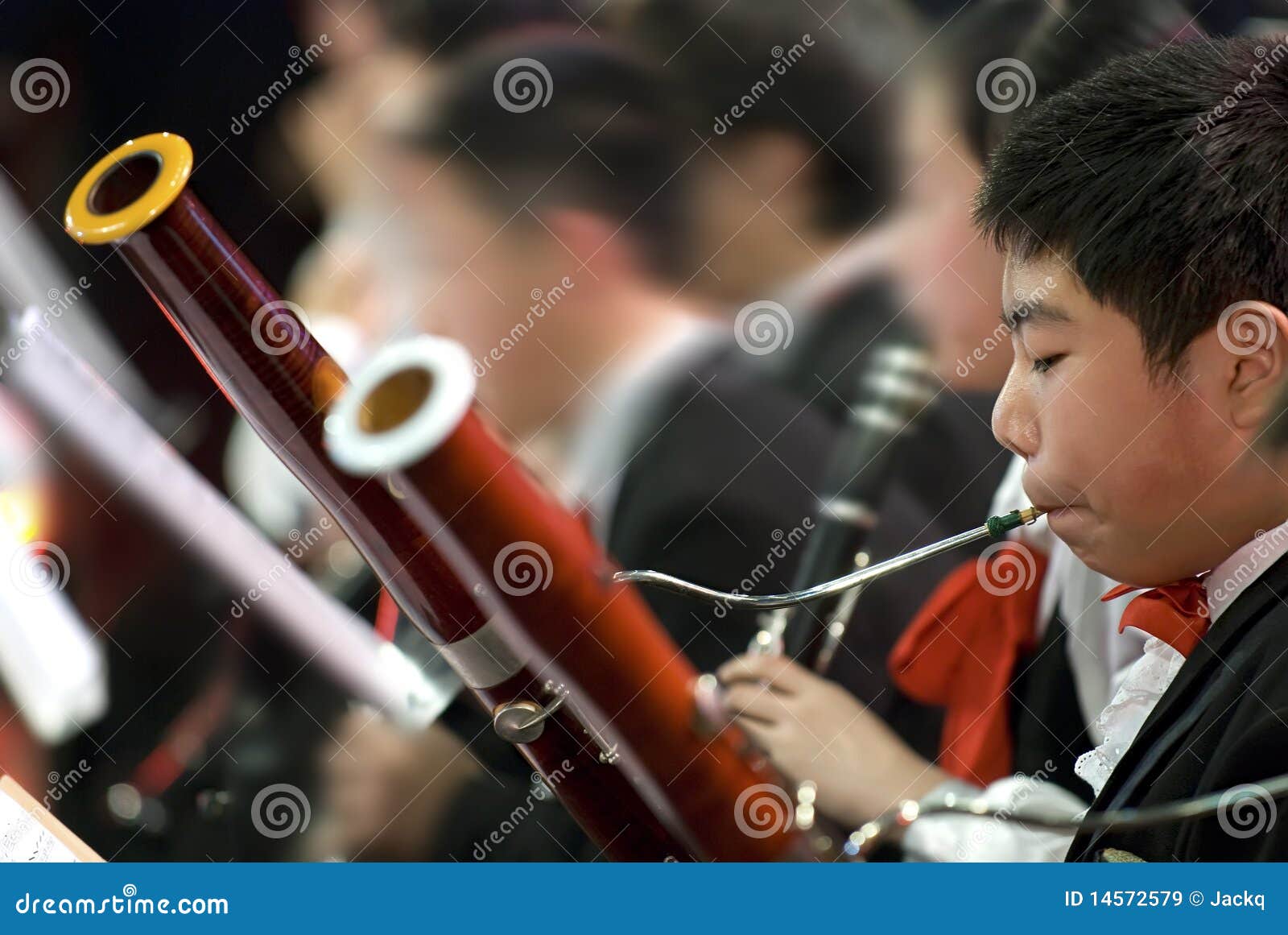 Bassoon boy stock image. Image of onstage, instrument - 14572579