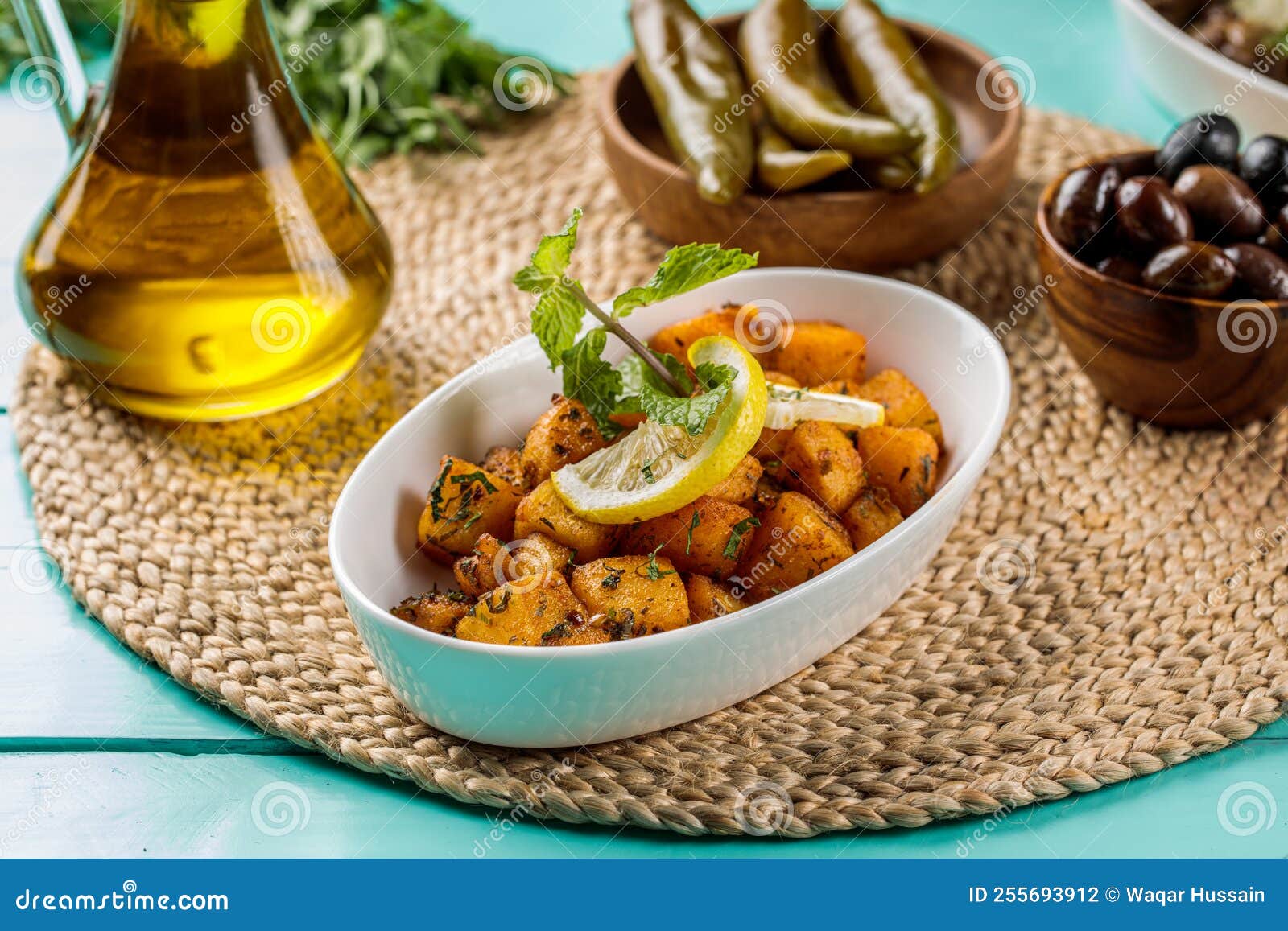 Batata Harra or Potatoes Served in a Dish Isolated on Cutting Board ...