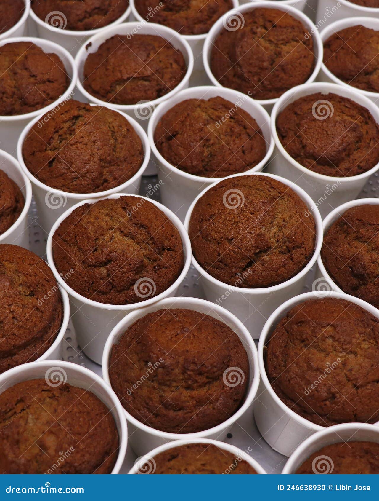 A Batch of Baked Date Pudding in White Cups Stock Photo - Image of ...