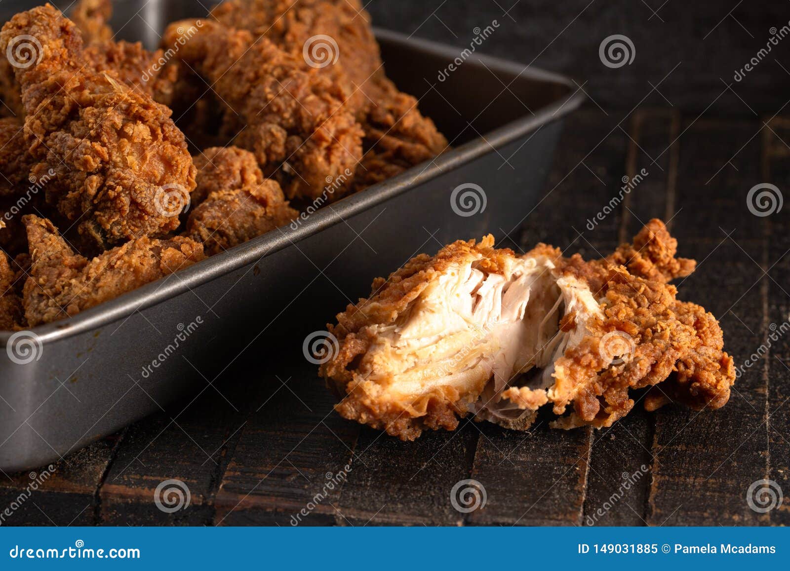 Batch of Crispy Homemade Fried Chicken on a Rustic Wooden Table Stock ...