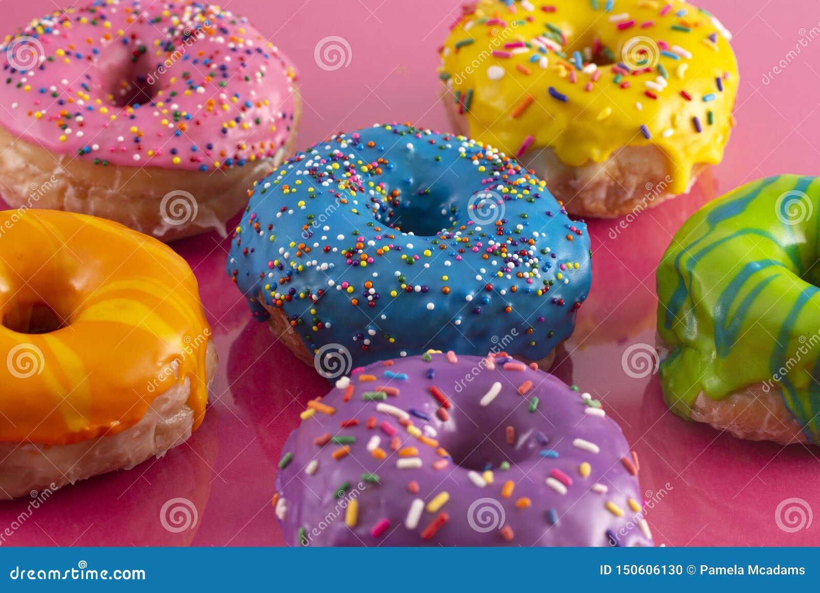 Batch of Rainbow Colored Glazed Donuts Stock Photo - Image of food ...