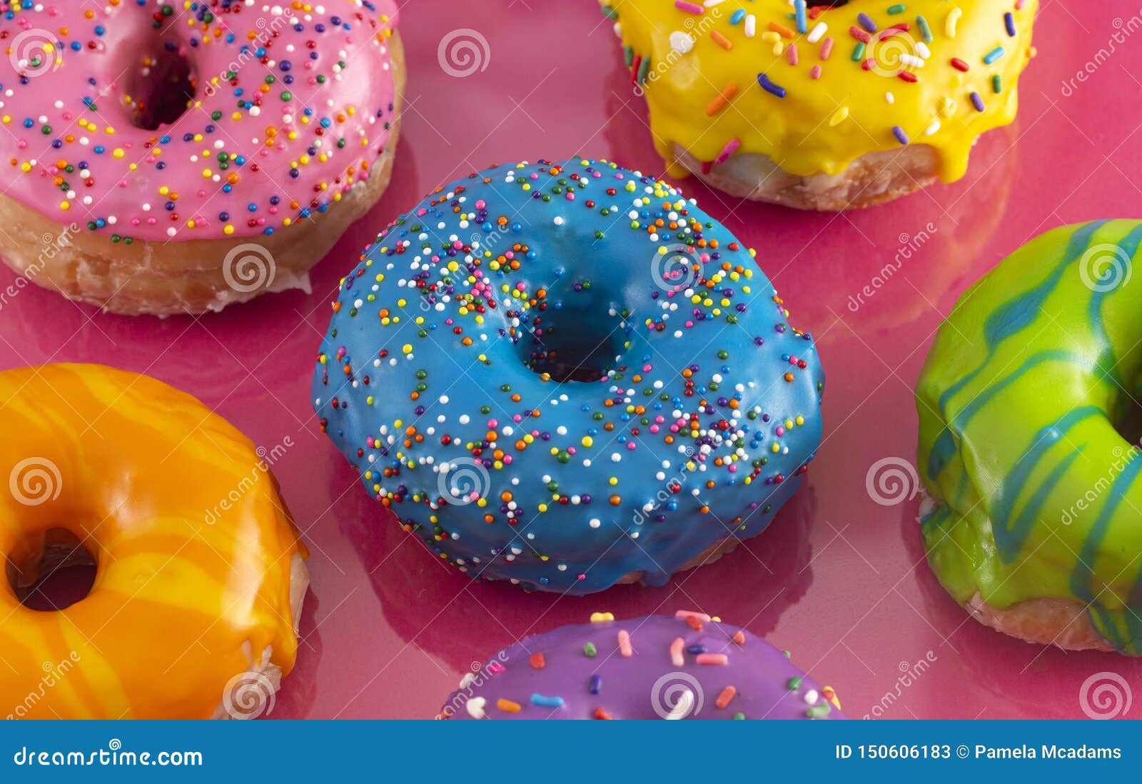 Batch of Rainbow Colored Glazed Donuts Stock Image - Image of sprikles ...