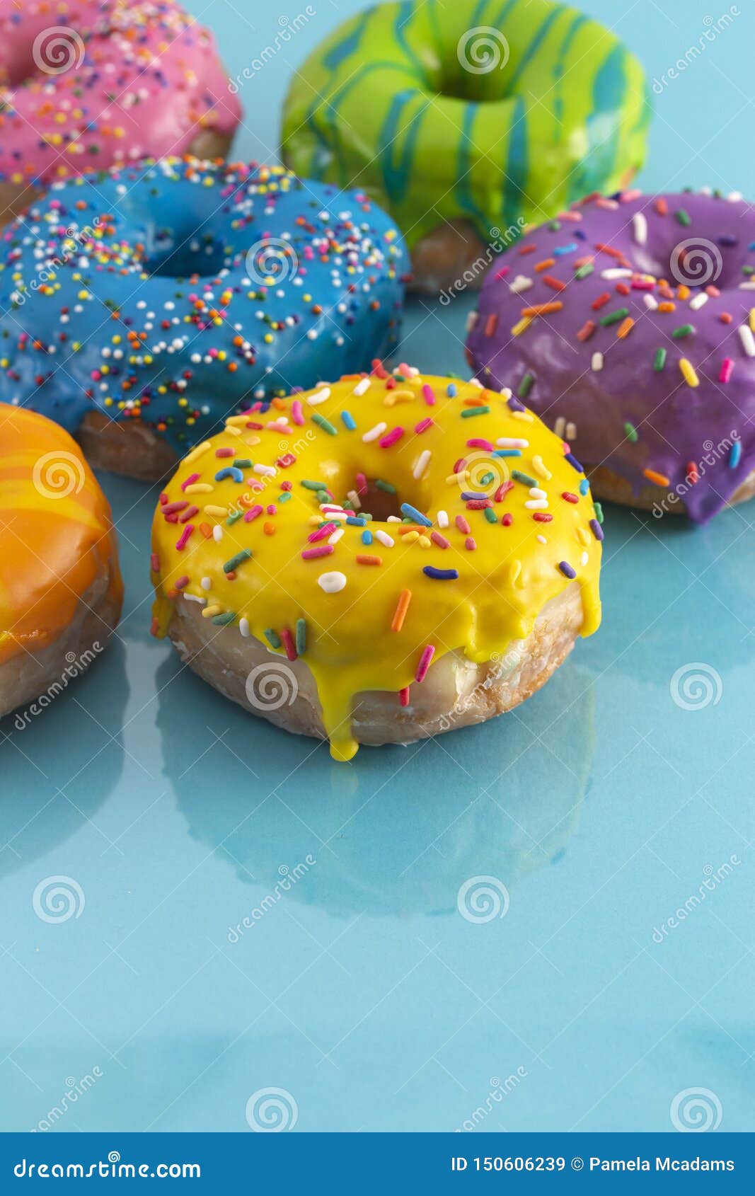 Batch of Rainbow Colored Glazed Donuts Stock Image - Image of blank ...