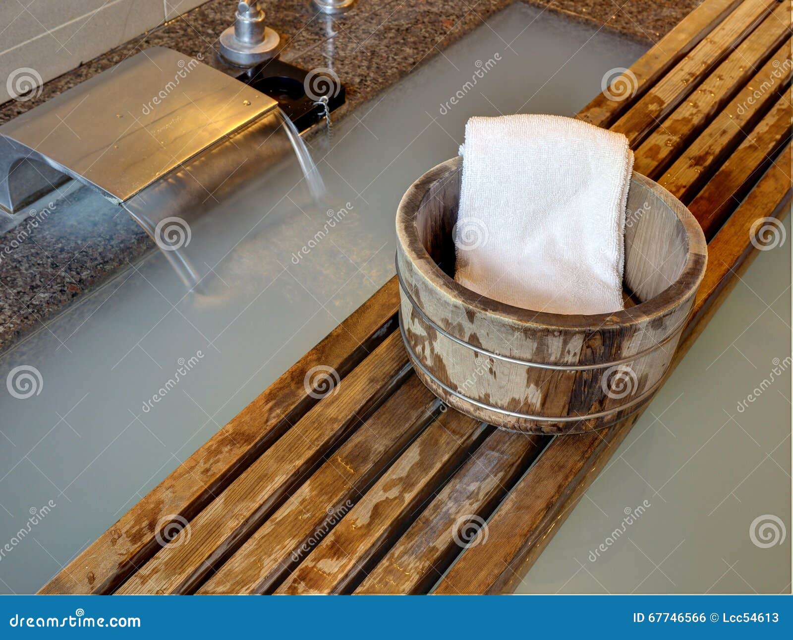 Bath bucket with a towel stock photo. Image of bottom - 67746566