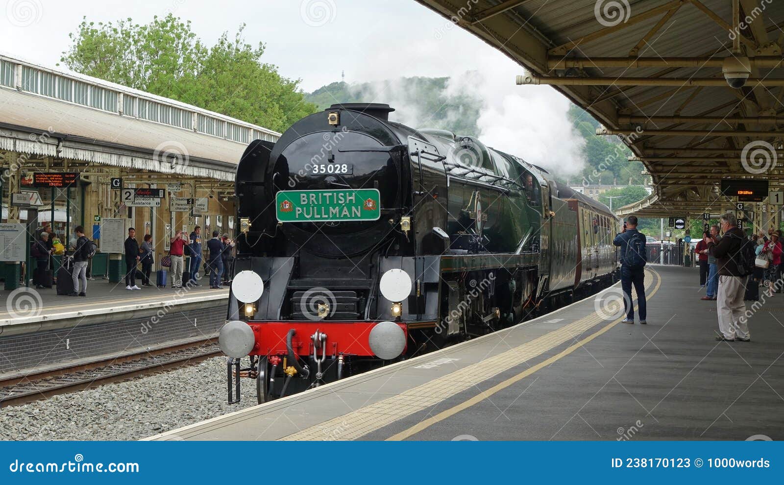 Steam Train at a Station editorial stock photo. Image of england ...