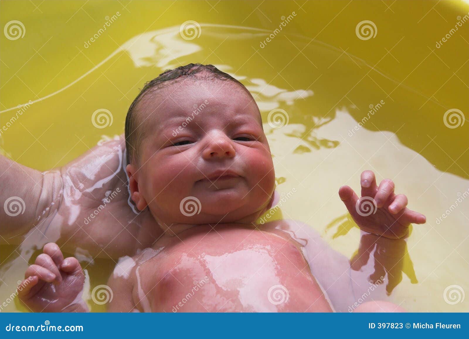 Bathing Baby stock image. Image of newborn, support, bath - 397823