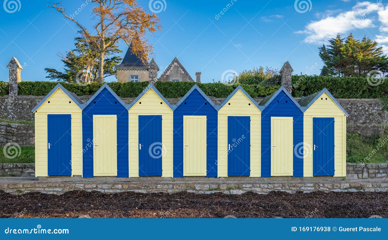 Bathing huts on the beach stock photo. Image of houses - 169176938