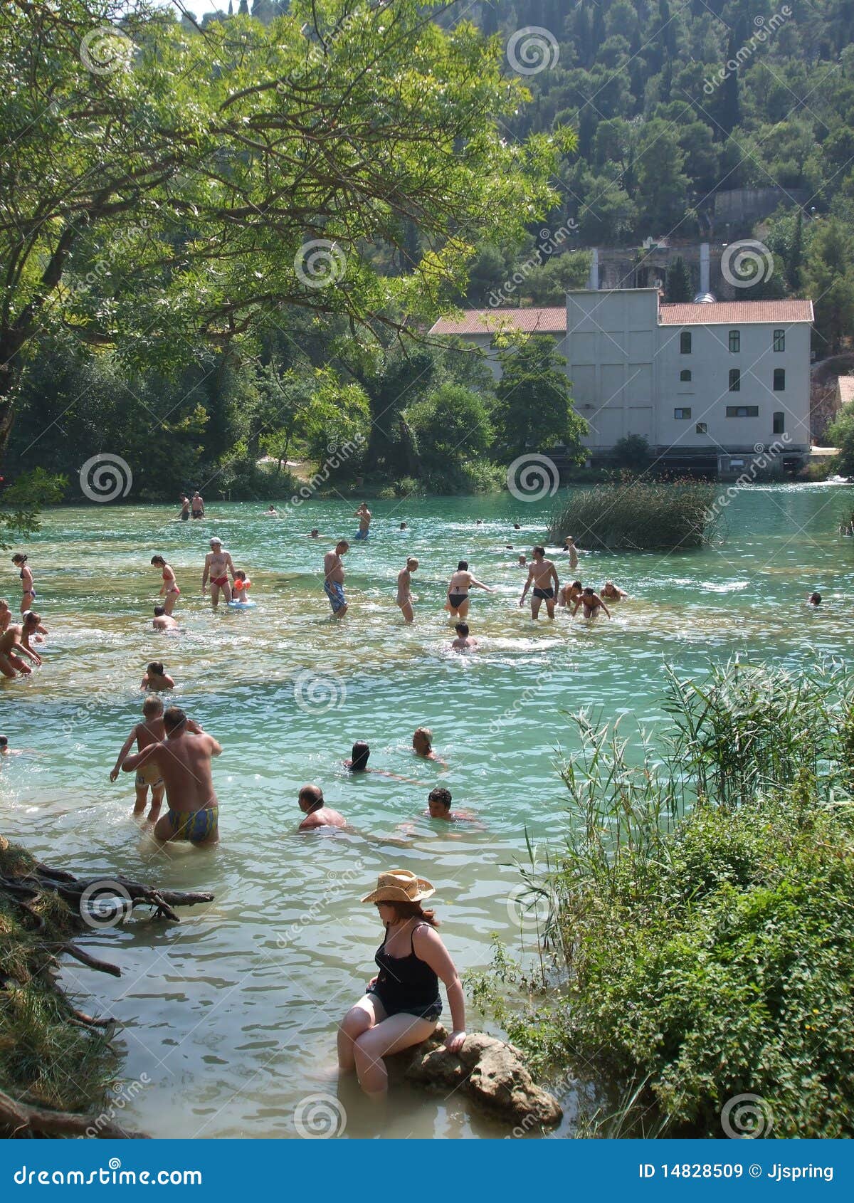 Bathing in a river editorial stock image. Image of crowd - 14828509