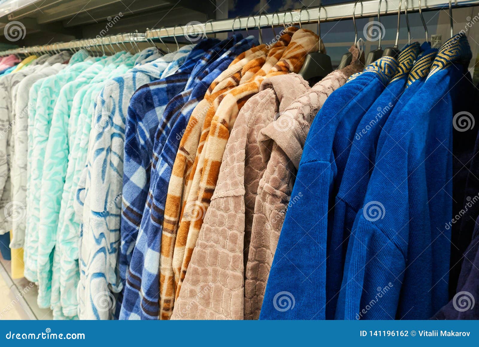 Hangers At A Clothing Store. Close Up Of Clothes Rack With Bokeh ...