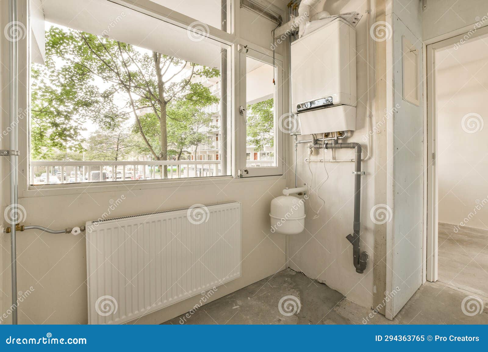 A Bathroom with a Large Window and a Urinal Stock Image - Image of ...