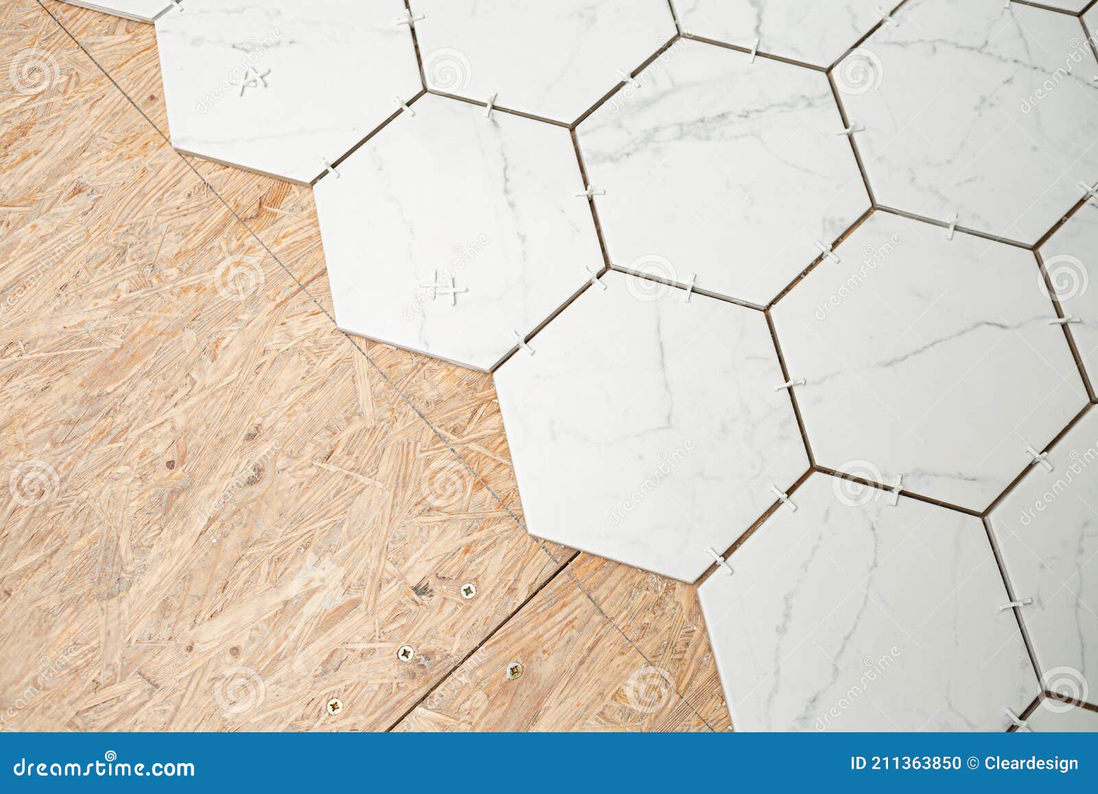 Bathroom Renovation - Ceramic Hexagonal Tile Laying. Interior Finishing ...