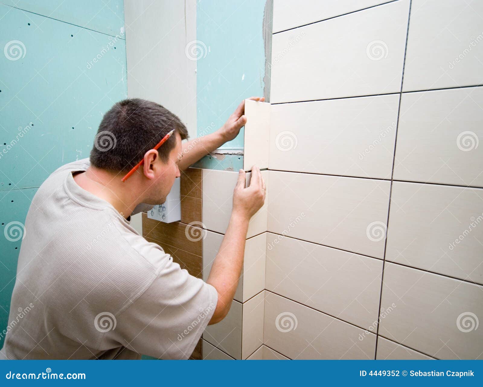 Bathroom tiles renovation stock photo. Image of male, concrete - 4449352