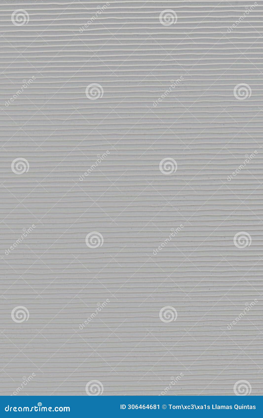 A Bathroom Wall with Cream-colored Grated Modern Style Tiles Stock ...