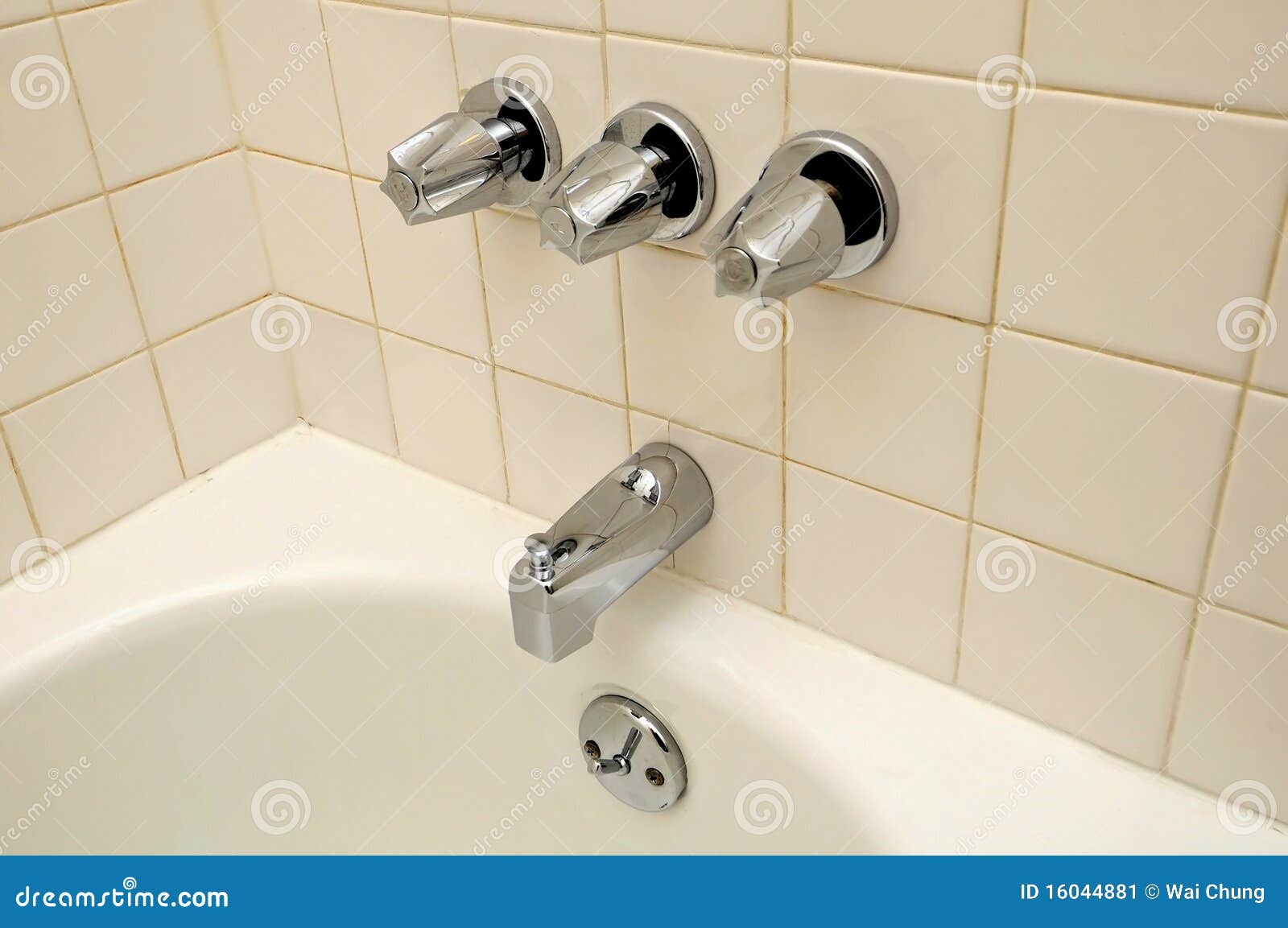 Bathtub and water taps stock image. Image of wash, bath - 16044881