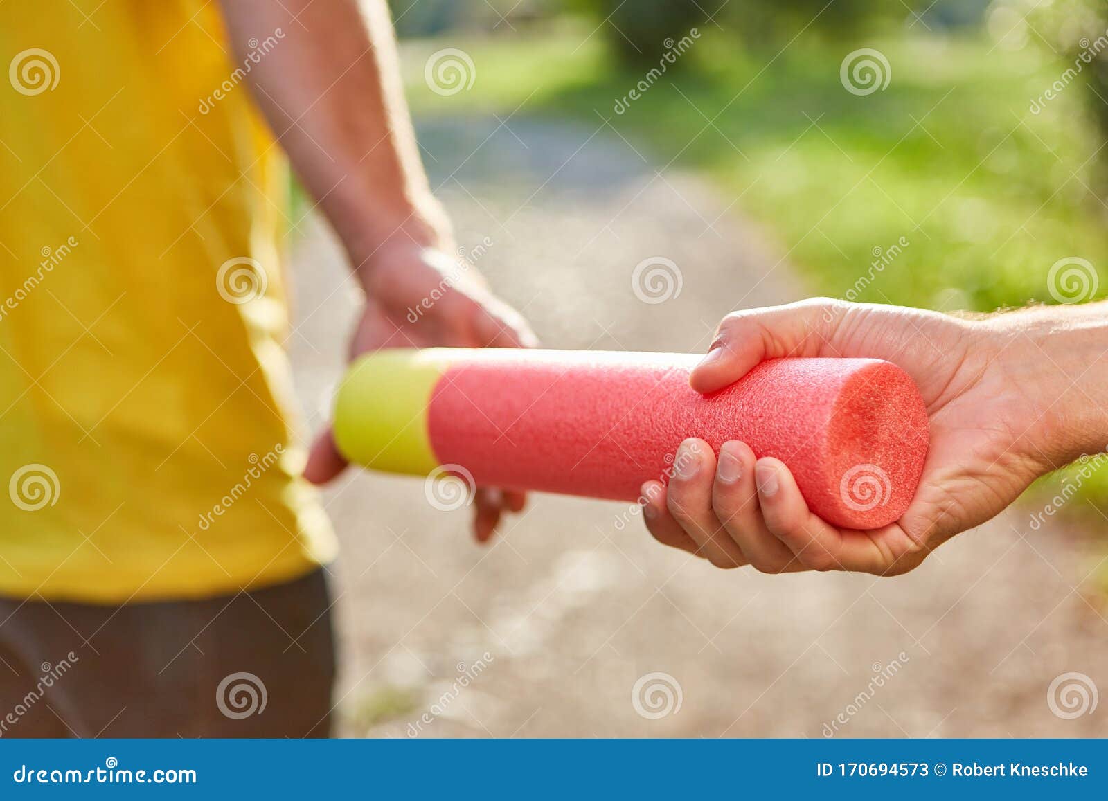 A baton is handed over stock image. Image of hold, touch - 170694573