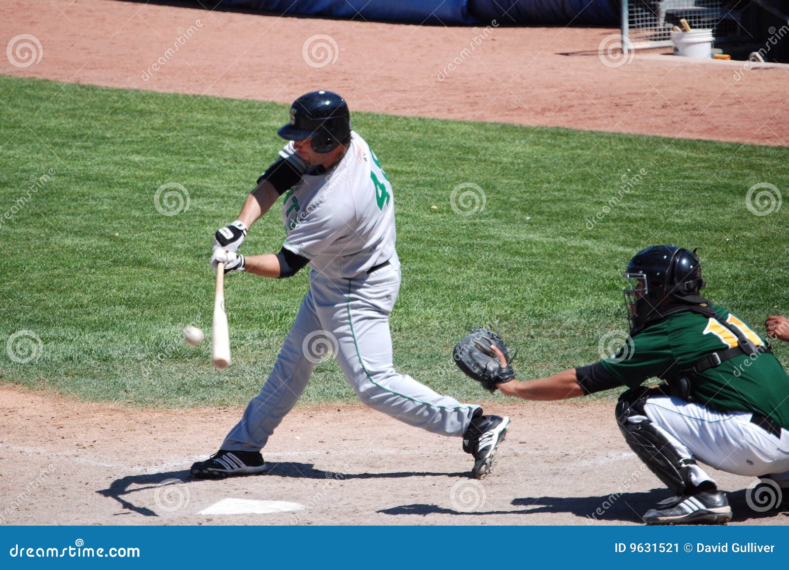 Batter hitting a ball editorial photo. Image of bend, catching - 9631521
