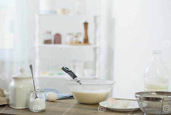 Batter on Wooden Table in White Kitchen Stock Photo - Image of cuisine ...