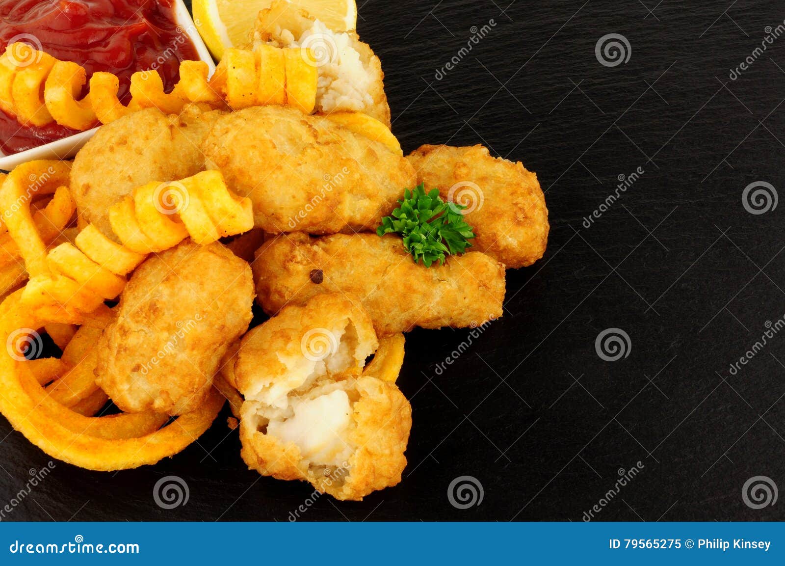 Battered Cod Nuggets With Curly Fries Royalty-Free Stock Photo ...