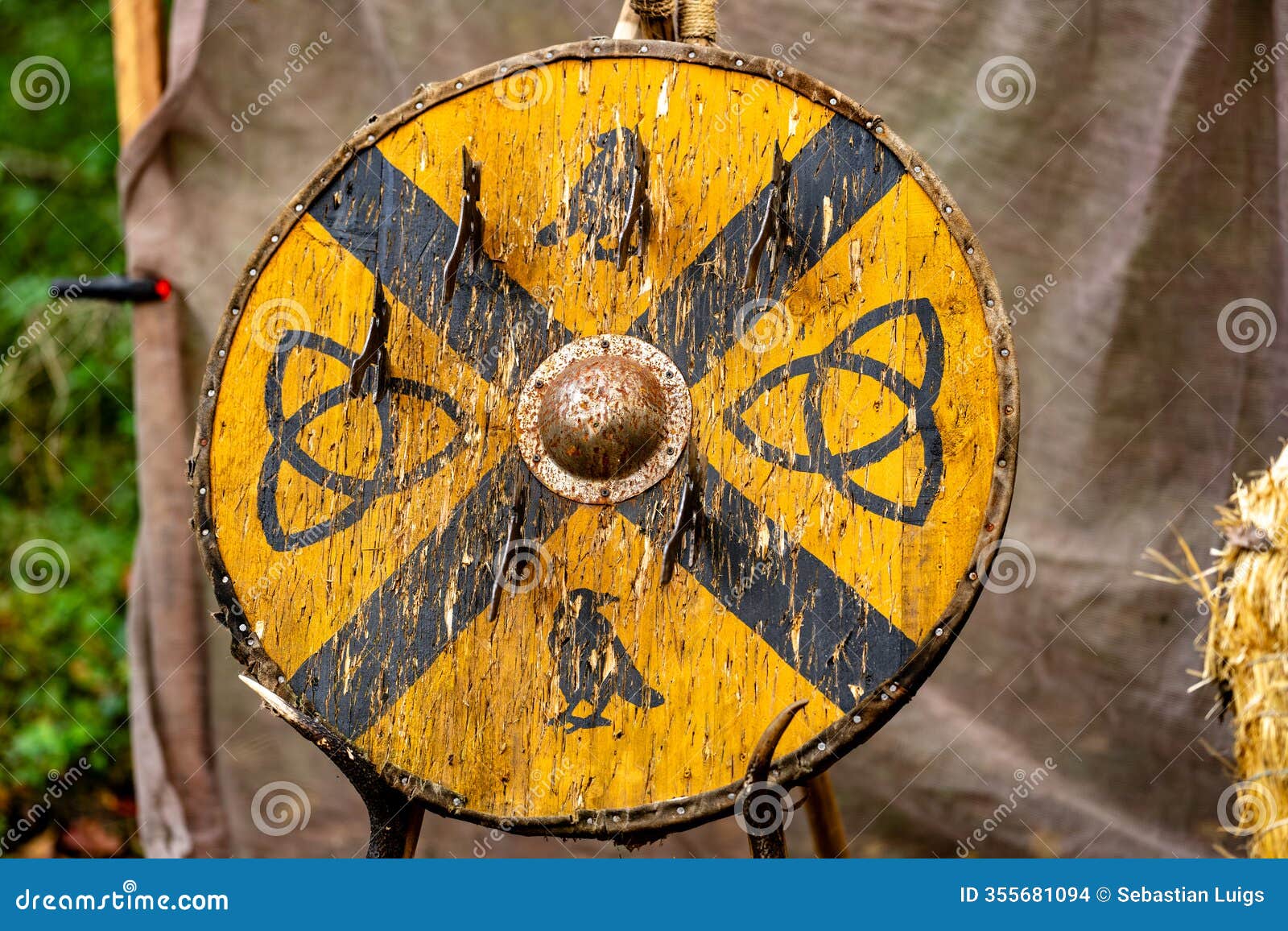 A Battered and Dirty Shield with a Celtic Cross on it Stock Photo ...