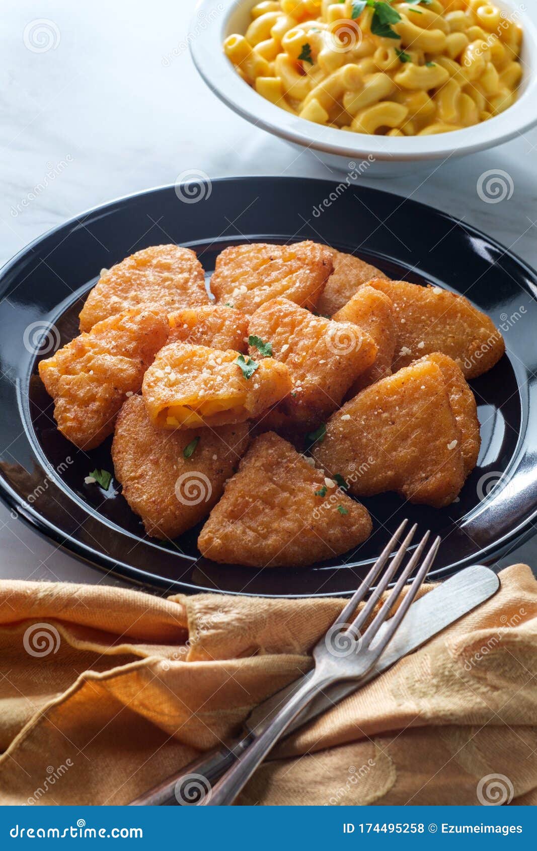 Battered Macaroni and Cheese Wedges Stock Photo - Image of fork, bites ...