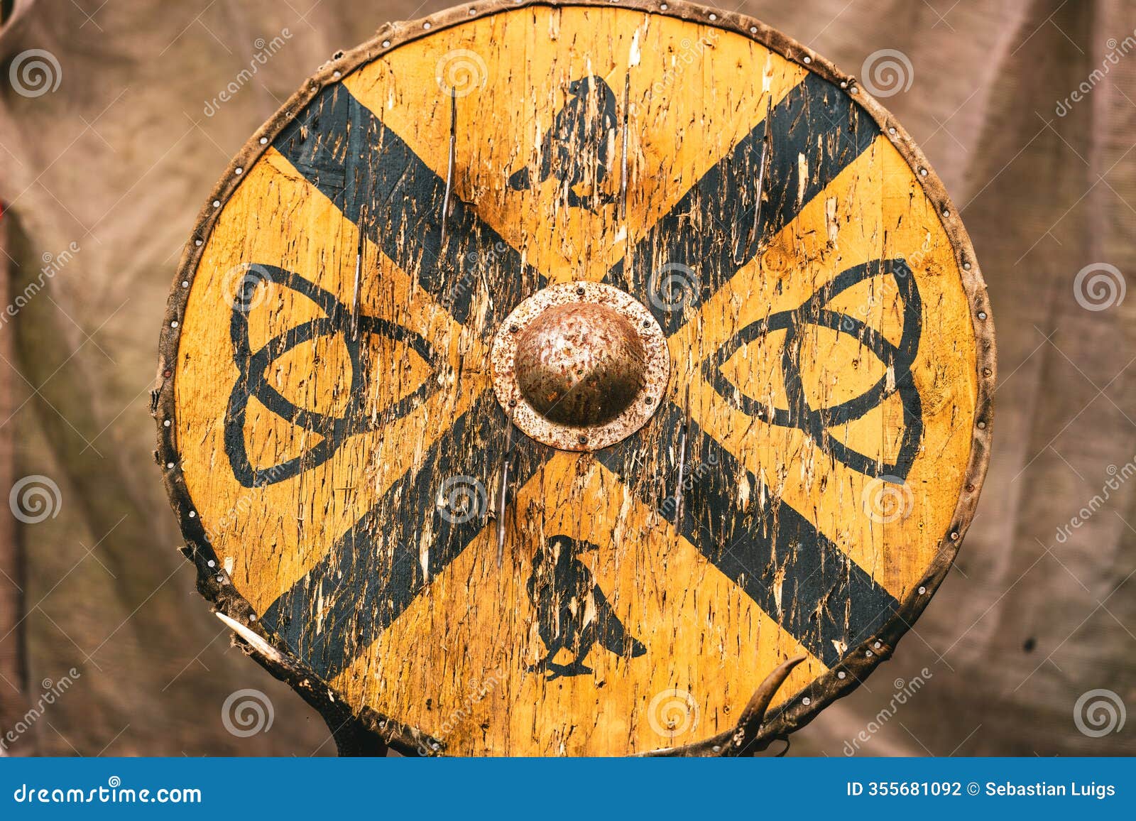 A Battered and Worn Viking Shield with a Cross on it Stock Photo ...