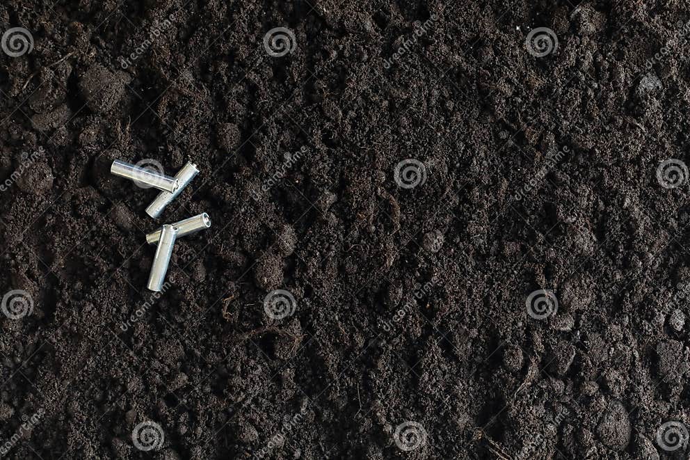 Batteries in the Ground. Environmental Pollution Stock Image - Image of ...
