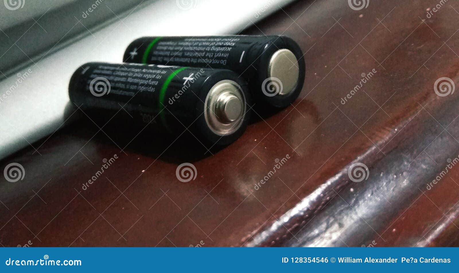 Battery AA plus and minus stock photo. Image of battery - 128354546