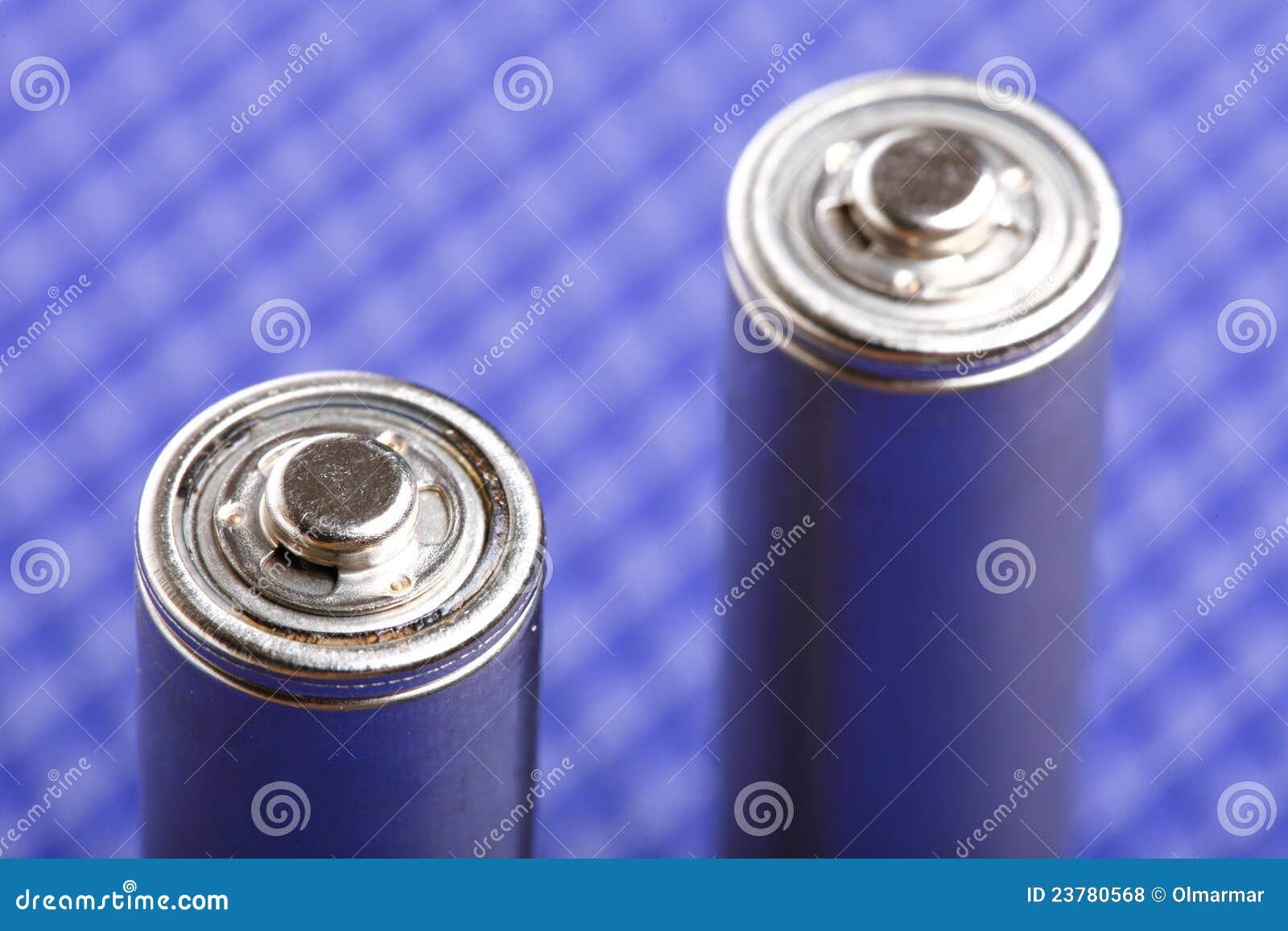 Battery on blue background stock photo. Image of industry - 23780568