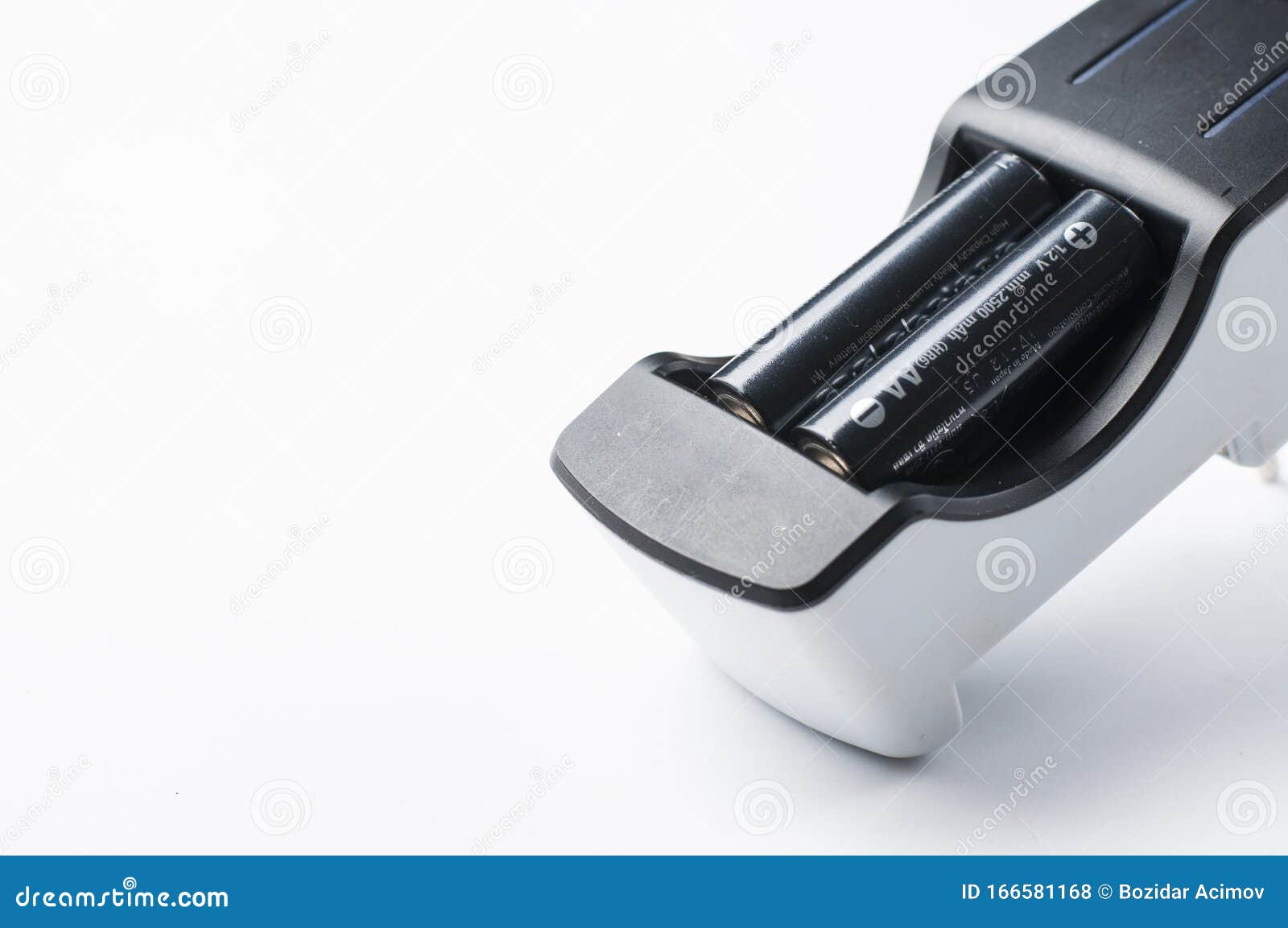 Battery Charger Isolated on White Background.Copy Space Stock Photo ...