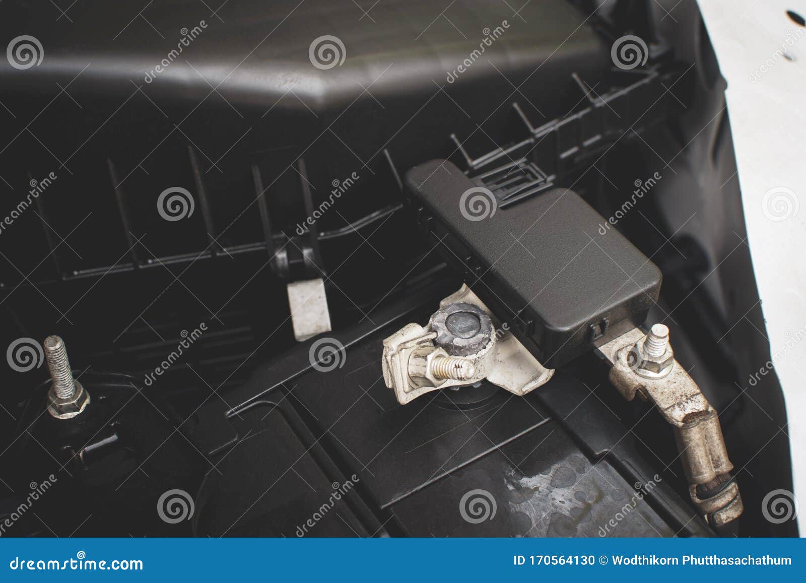 Battery Negative Pole Terminal and Wire Installed on a Black Battery in ...