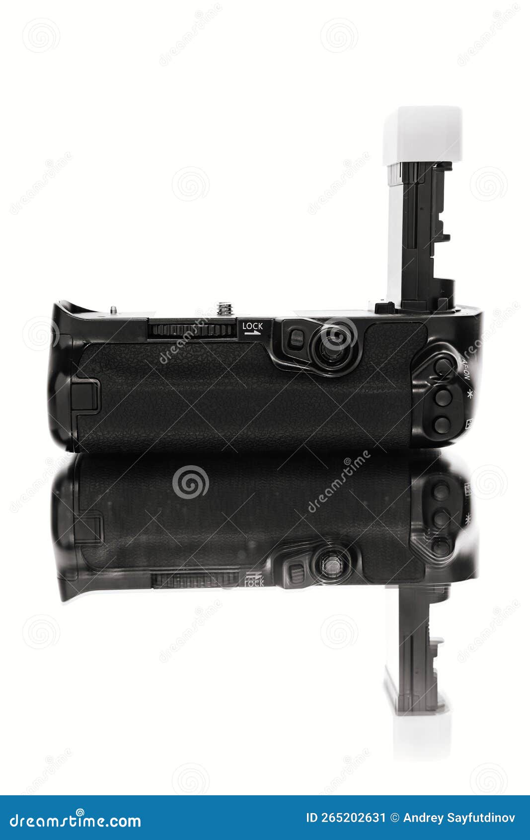 Battery Pack for the Camera on a Mirror Surface. Stock Image - Image of ...