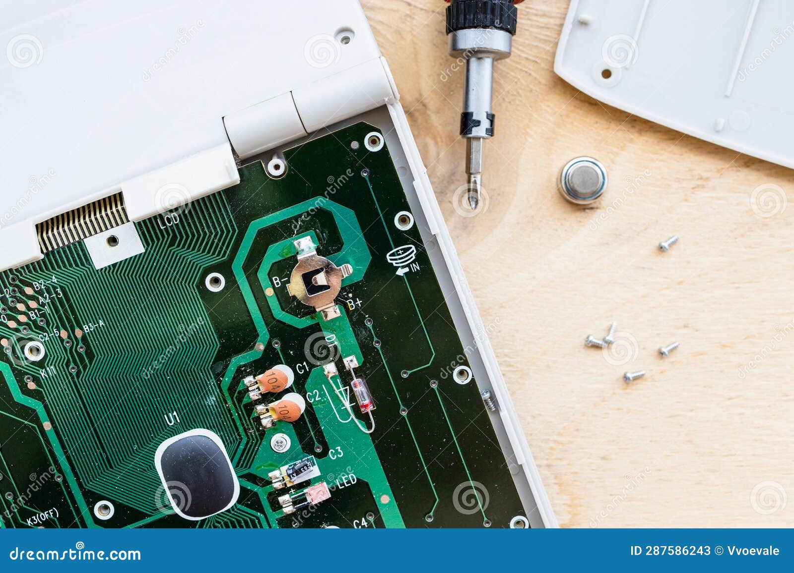 Battery Replacement in Circuit Board of Calculator Stock Image - Image ...